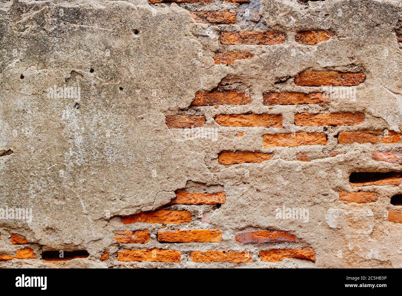 Weathered old ruin concrete wall reveal brick cracked inside grunge ...
