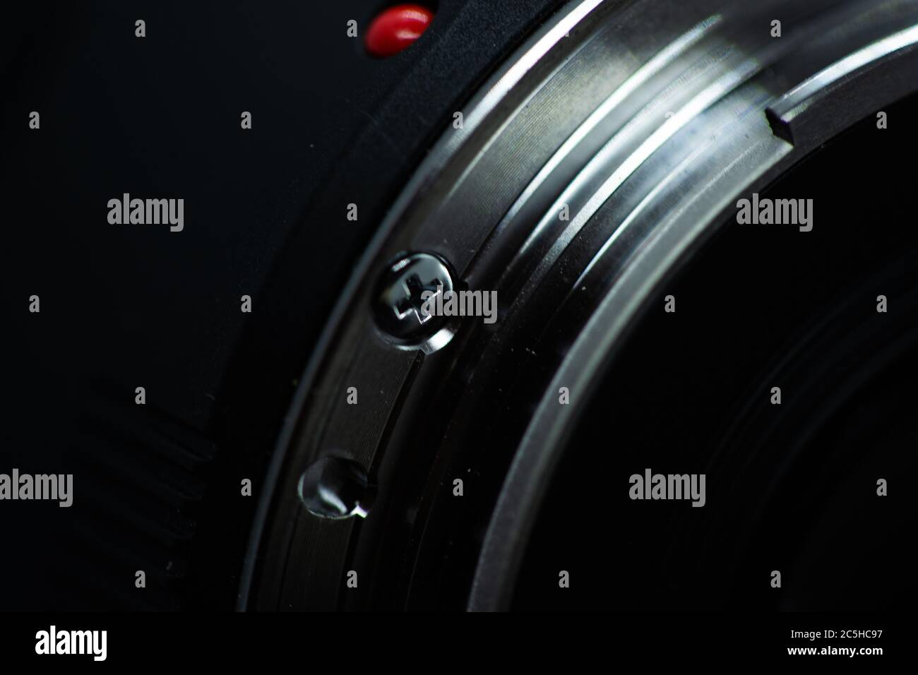 Macro closeup photo of lens to dslr camera on dark background view of ...