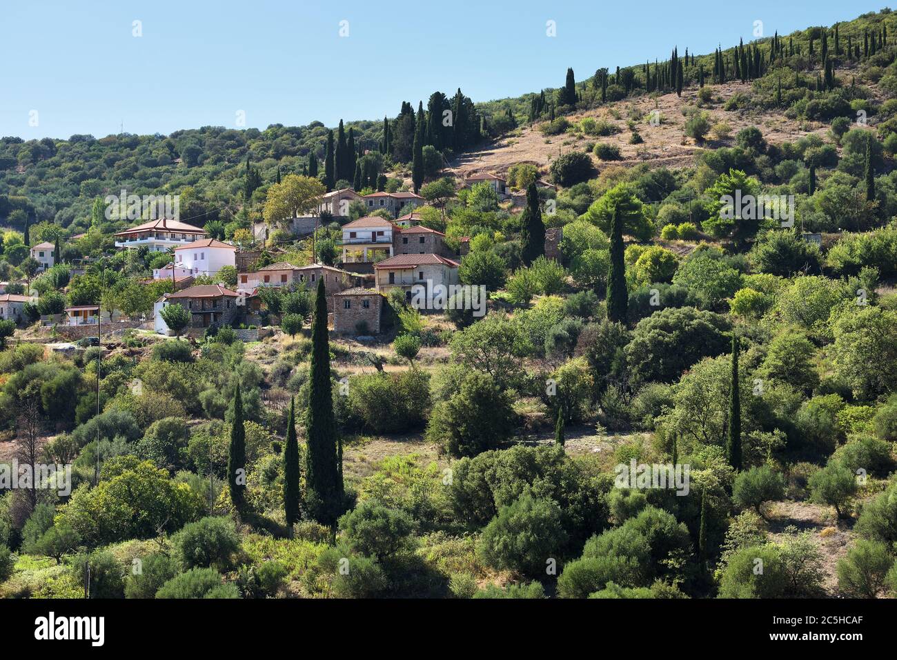 Picturesque mountain village in Greece shown at sunset, Messinia ...