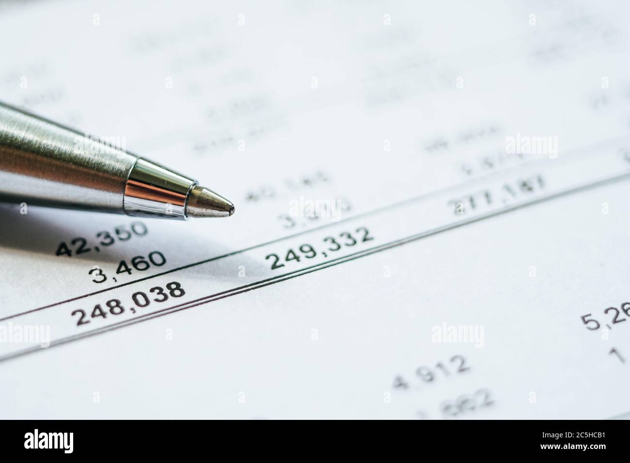 Financial calculation numbers chart with pen, calculator, glass and ...