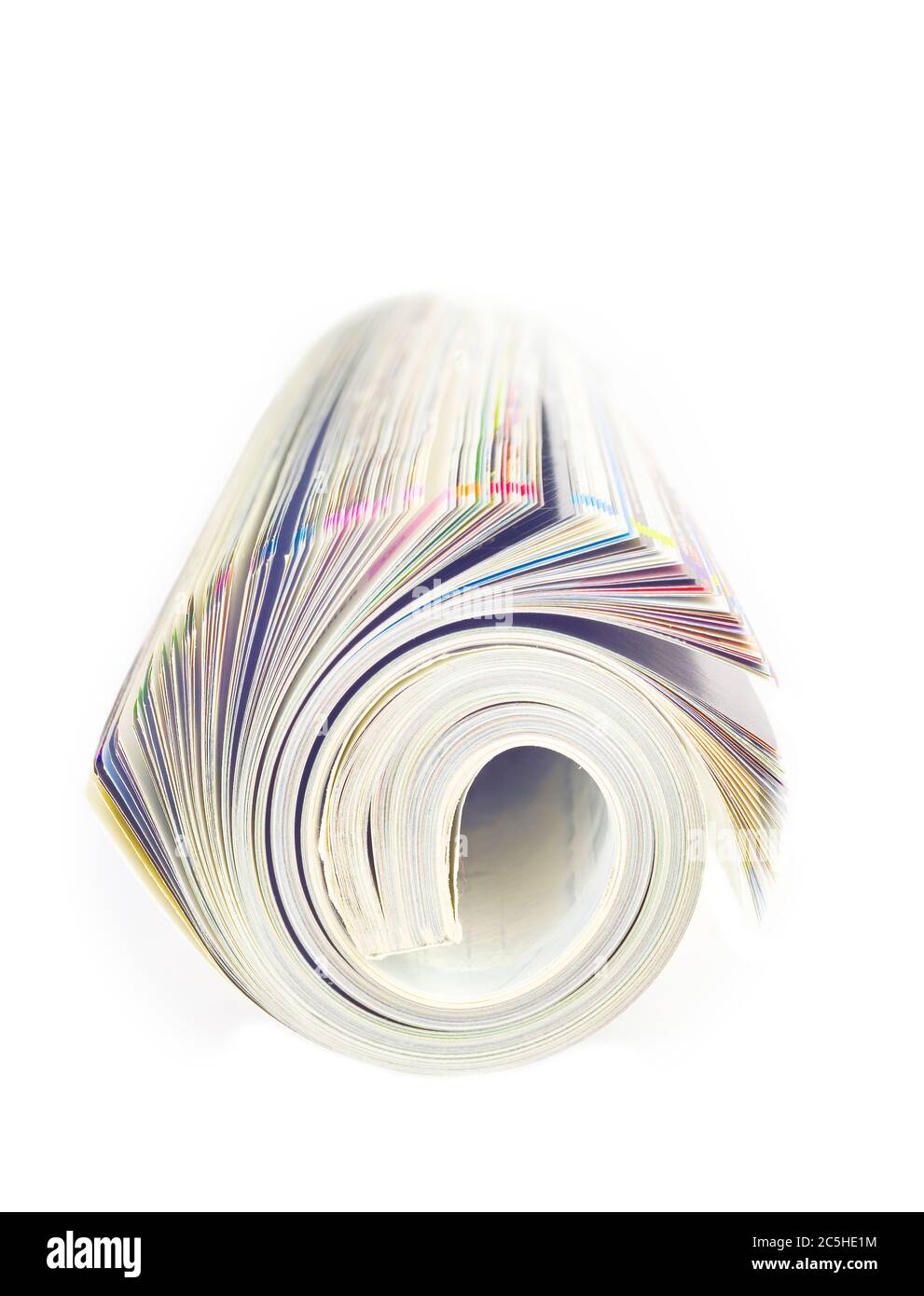 Rolled up magazine, newspaper, selective focus, white background Stock ...