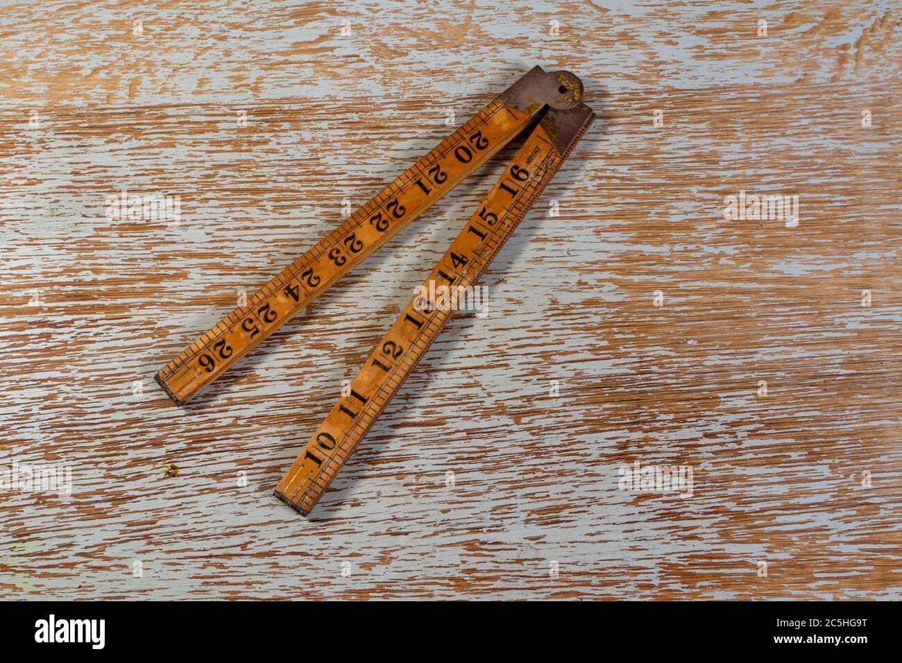 Old school carpenter's three foot folding rule Stock Photo - Alamy