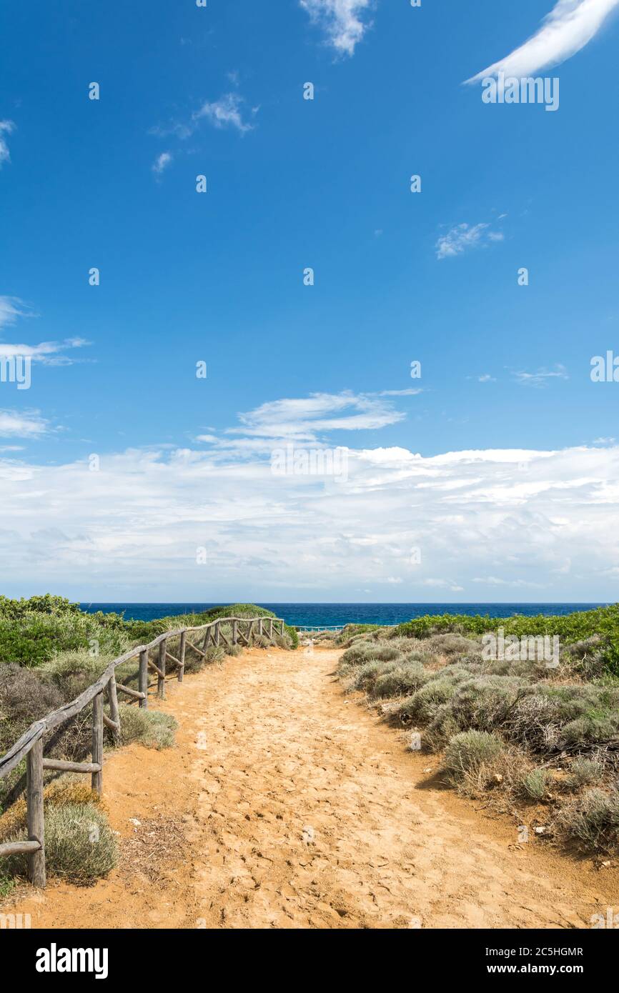 Foot path leading towards the ocean in Mediterranean landscape Stock ...