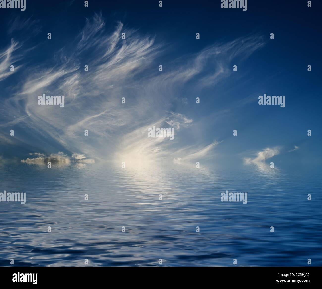 Dramatic sky with clouds reflected in water Stock Photo - Alamy