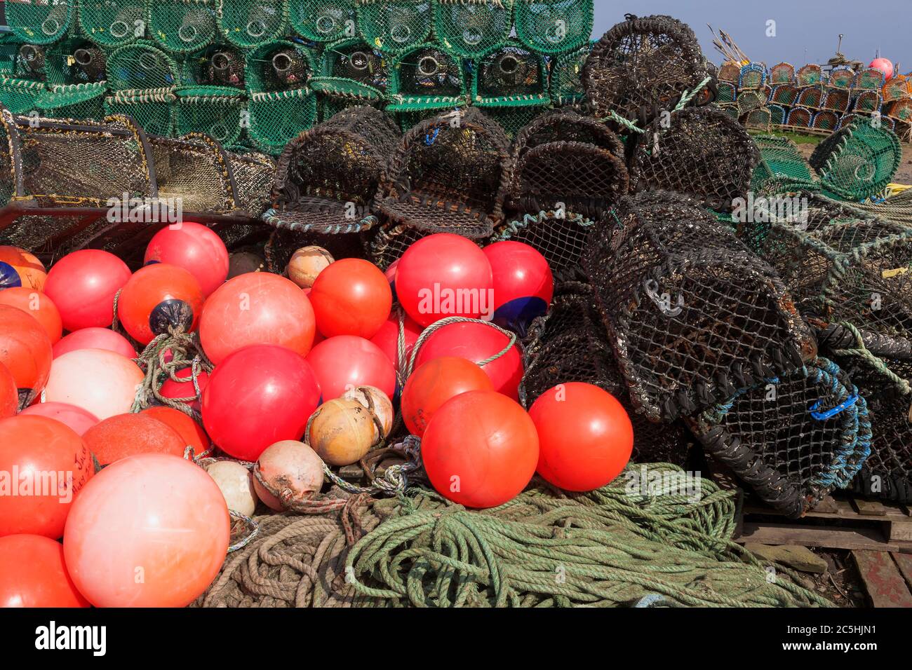 Close-up of crab pots, fishing lines and floats on The Common, Holy ...
