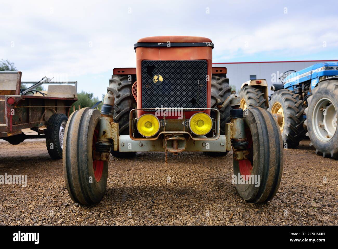 Old wrecked tractor on a junkyard Stock Photo - Alamy