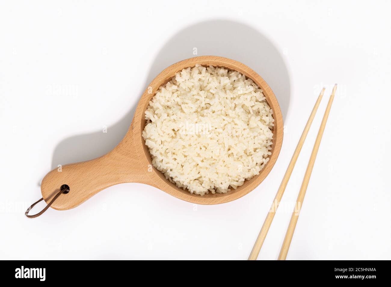 Eating rice with chopsticks Cut Out Stock Images & Pictures - Alamy
