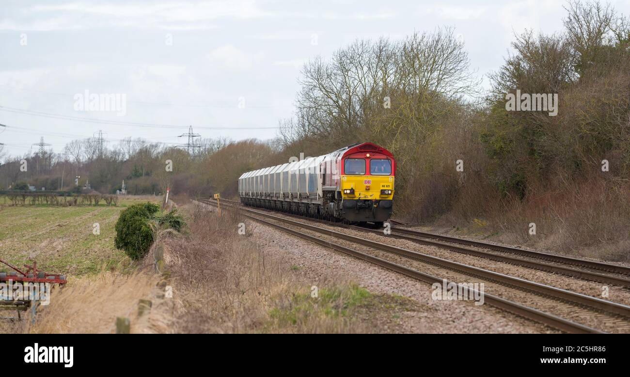 DB Schenker class 66 diesel locomotive hauling freight through the ...
