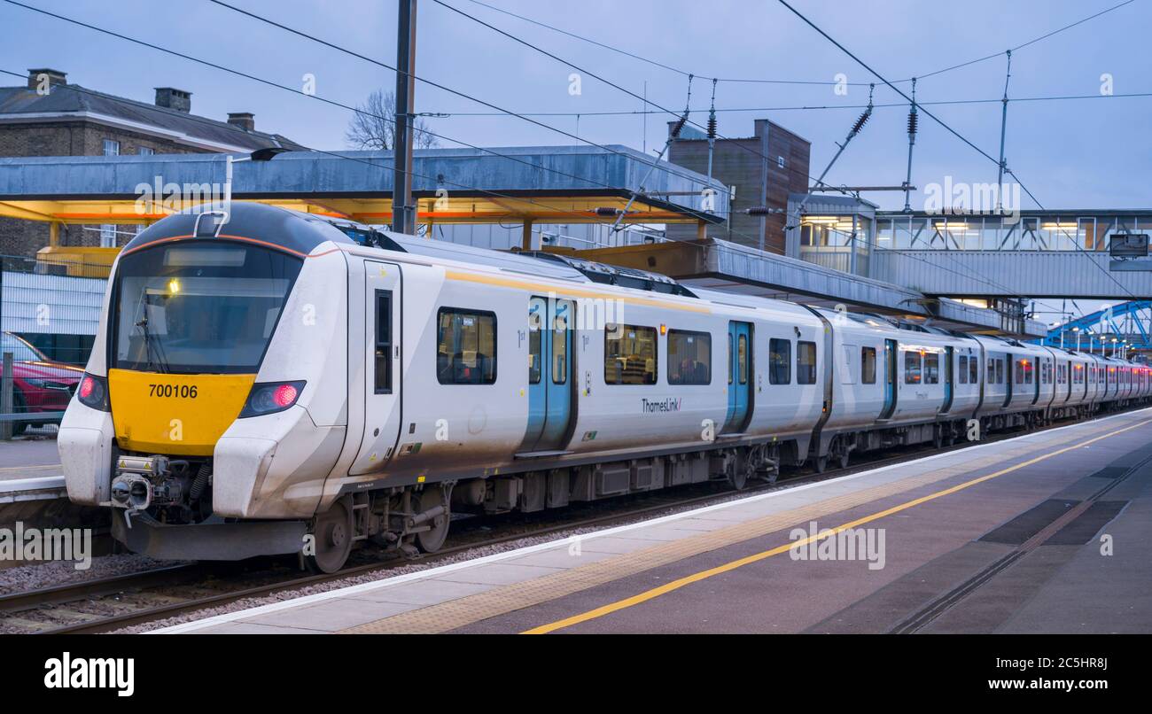Thameslink class 700 passenger train waiting at a railway station in ...