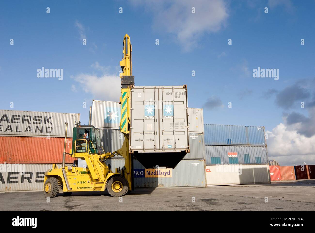 CVS Ferrari container handler being used to move shipping containers at ...