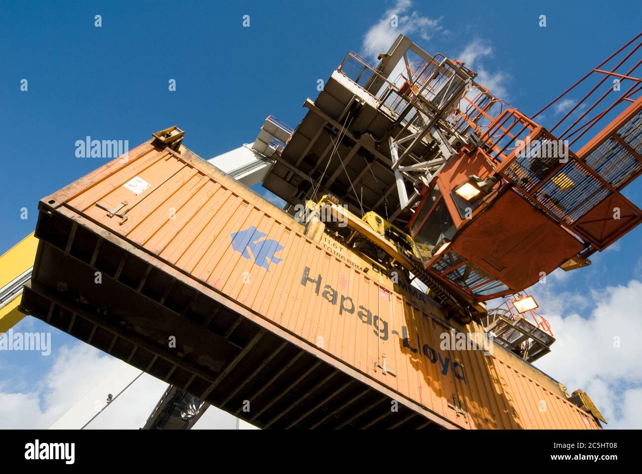 Rail mounted crane being used to load and unload shipping containers at ...
