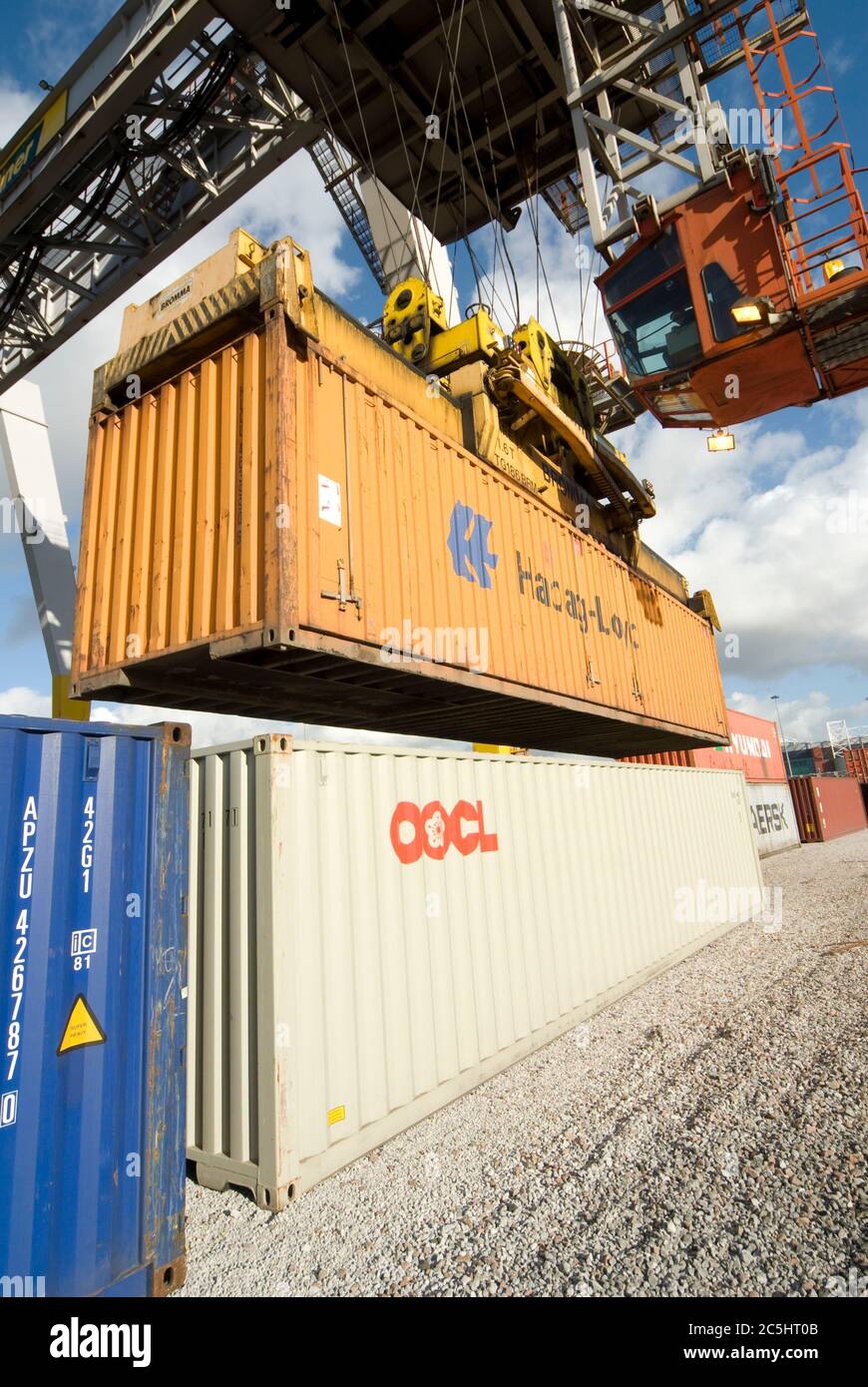 Rail mounted crane being used to load and unload shipping containers at ...