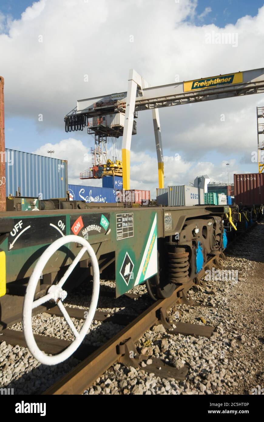 Rail mounted crane being used to load and unload shipping containers at ...