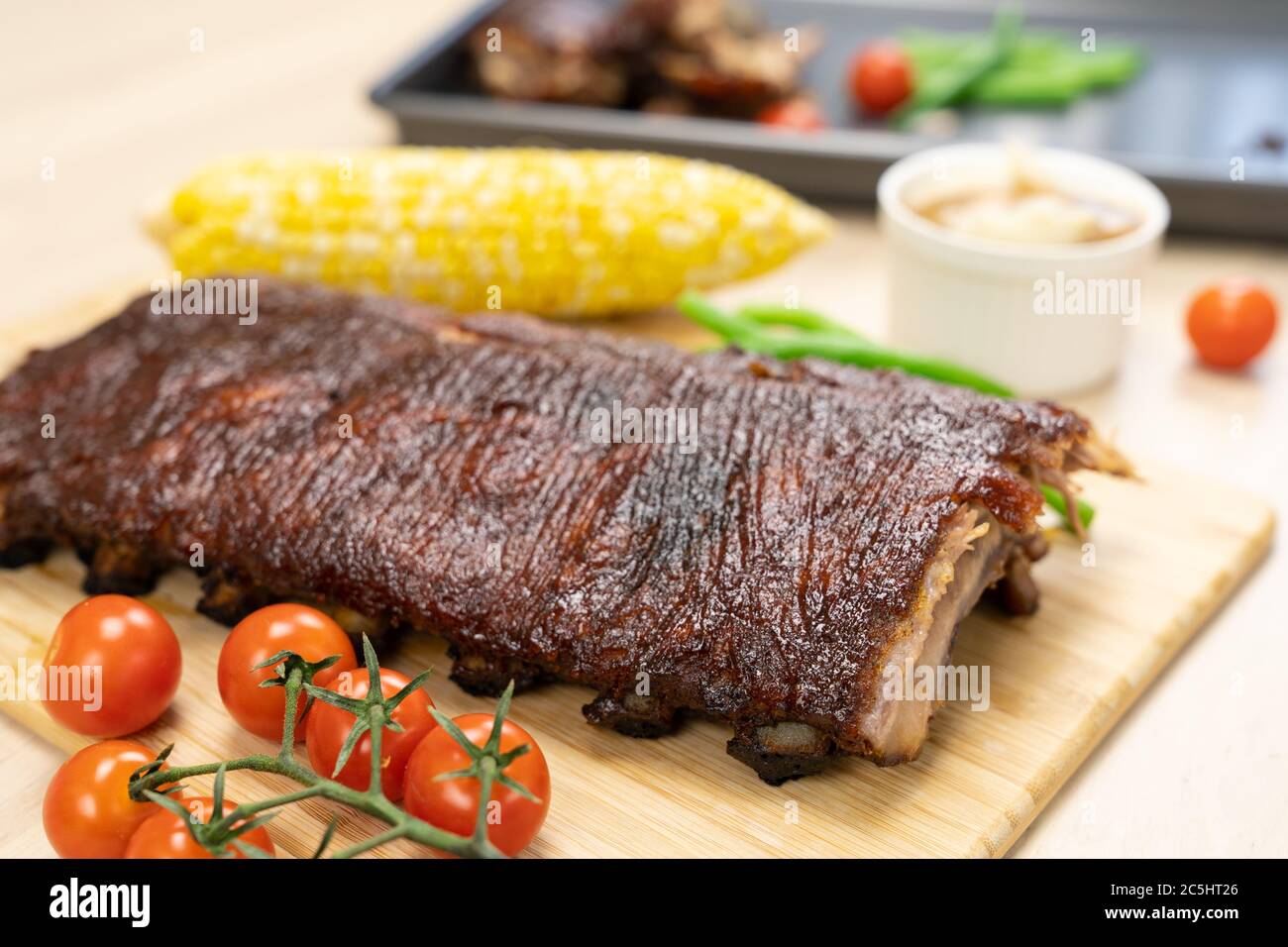 Oven baked BBQ pork ribs Stock Photo - Alamy