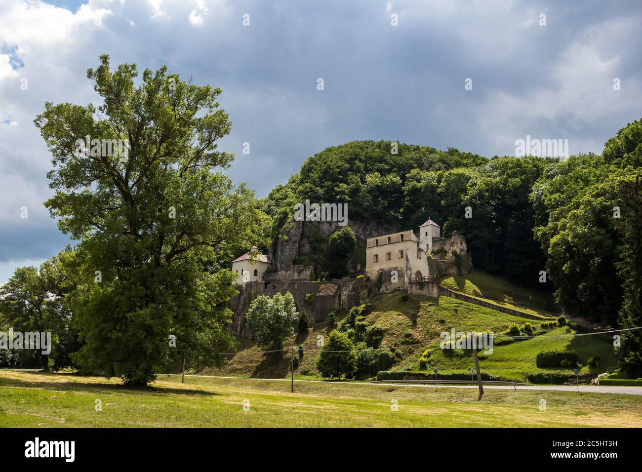 Gothic building of the monastery, built in a mountain, surrouded by ...