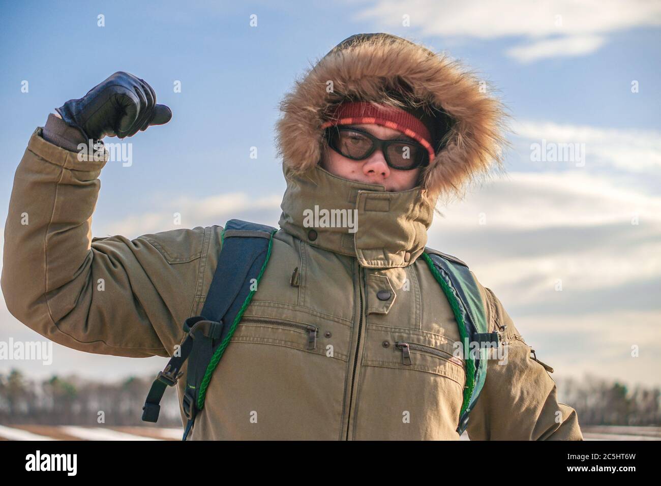Polar men looks forward against a blue winter sky Stock Photo - Alamy