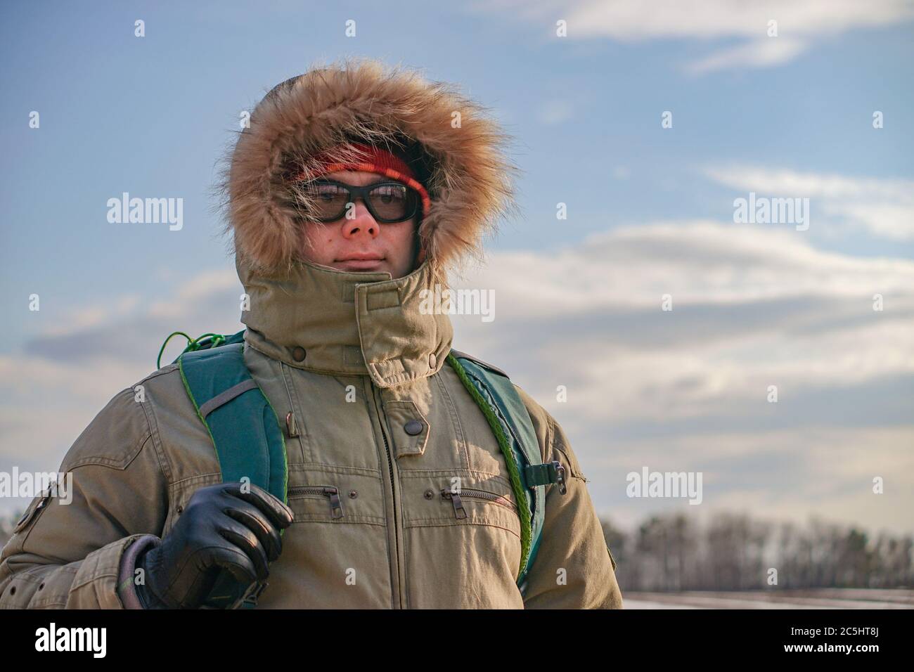 Polar men looks forward against a blue winter sky Stock Photo - Alamy