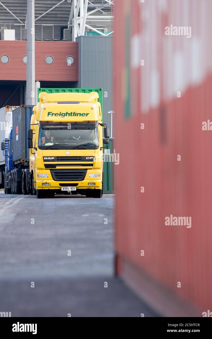 Freightliner lorry loaded with a shipping container at Manchester ...