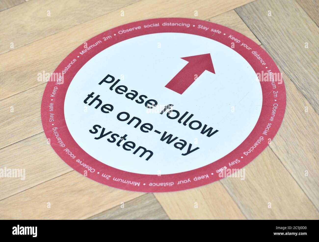 Social distancing signage in a retail showroom in Evesham ...