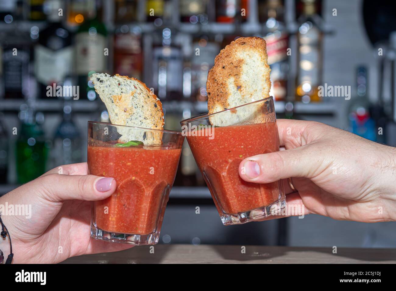 Gazpacho tomato soup. Cool summer lunch. In a glass decorated with ...