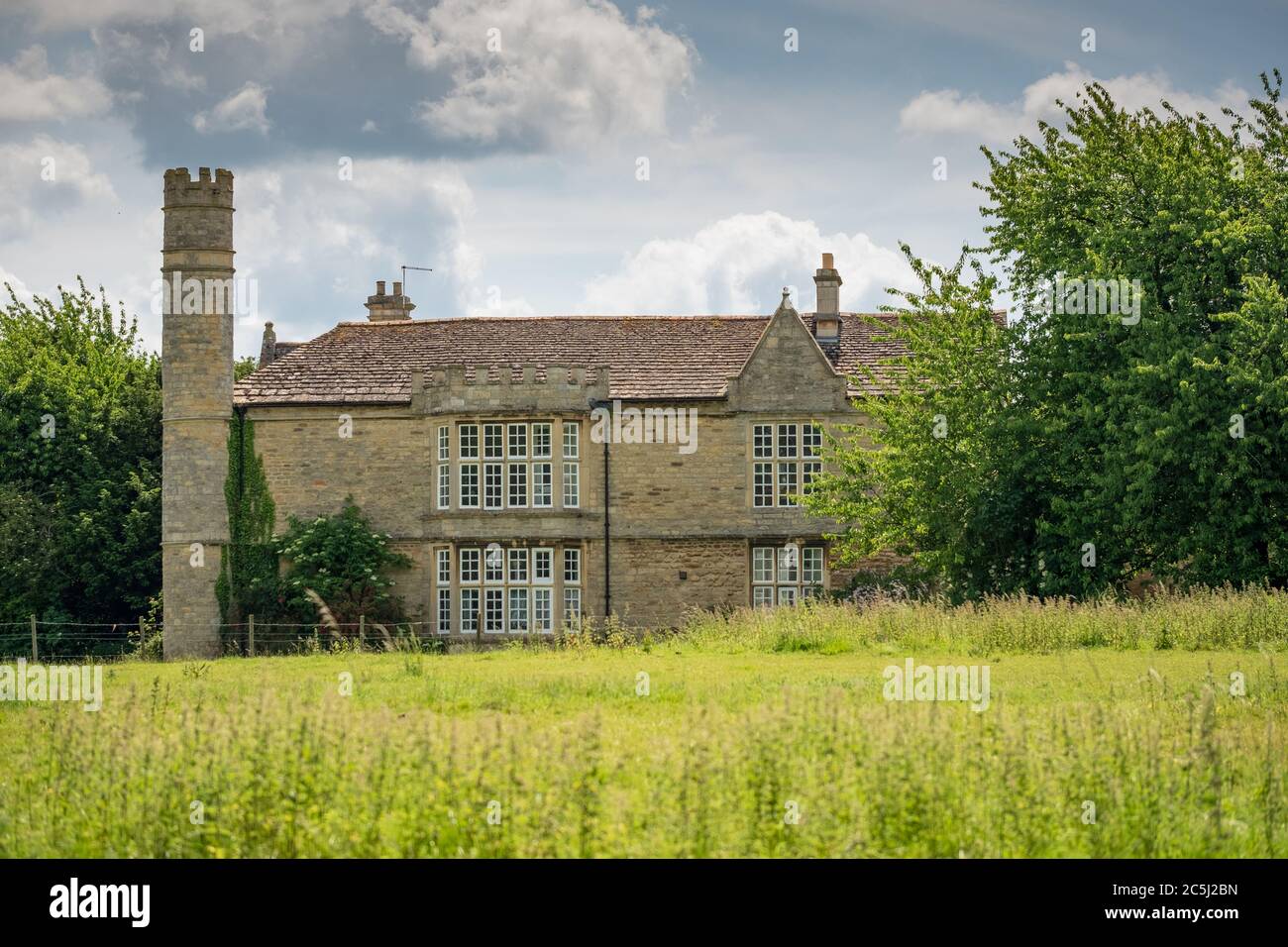 Detailed, majestic view of an unusual, Grade 2 listed, stone built ...