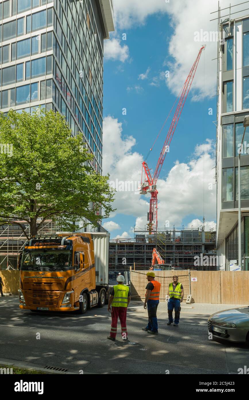 Semi truck driving backwards to a large construction site, Frankfurt ...