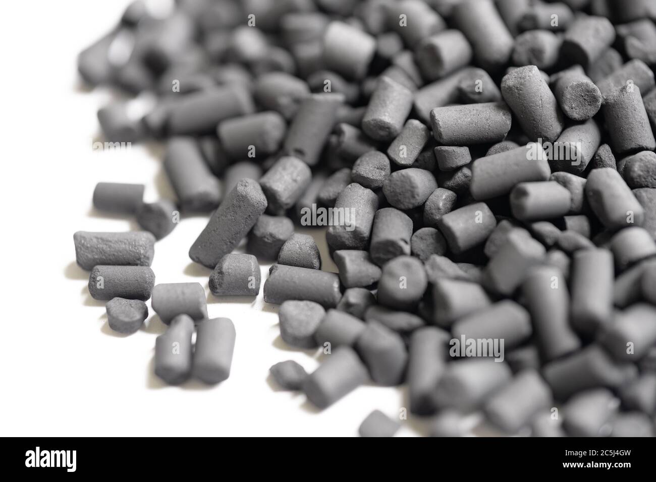 Macro view of small activated Carbon granules seen in a heap. Used in ...