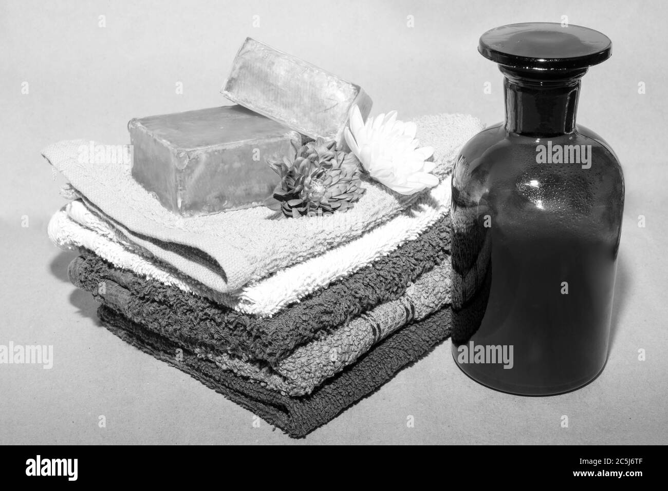 soap bar on top of facecloths off various shades with flowers and ...