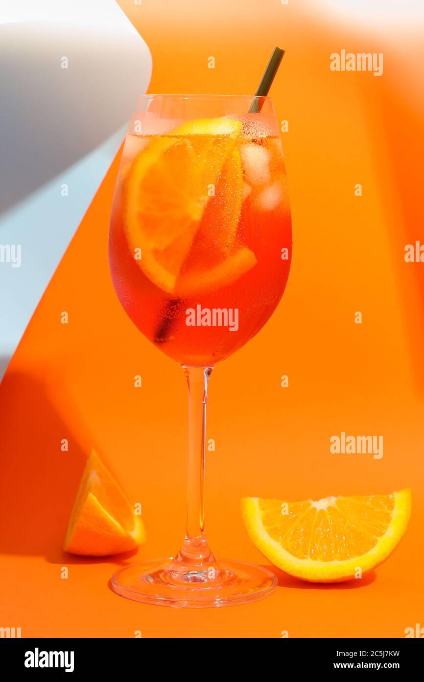 Aperol spritz cocktail on color background. Summer drink Stock Photo ...