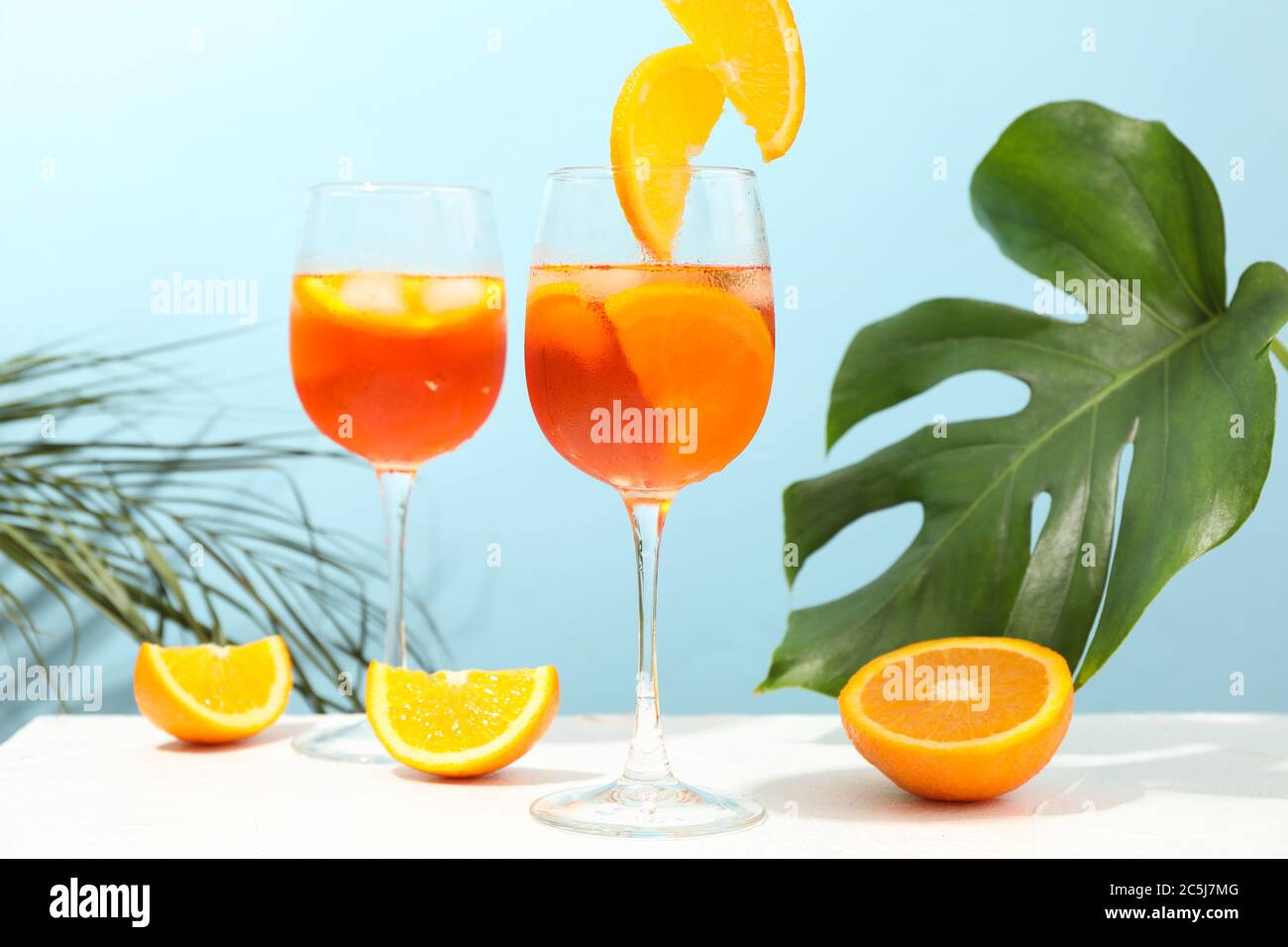 Composition with aperol spritz cocktail on color background. Summer ...