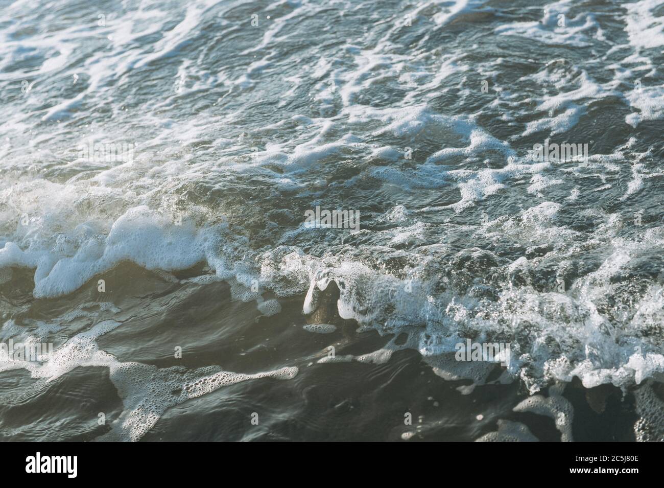 Waves in ocean Splashing Waves. Sunshine Stock Photo - Alamy