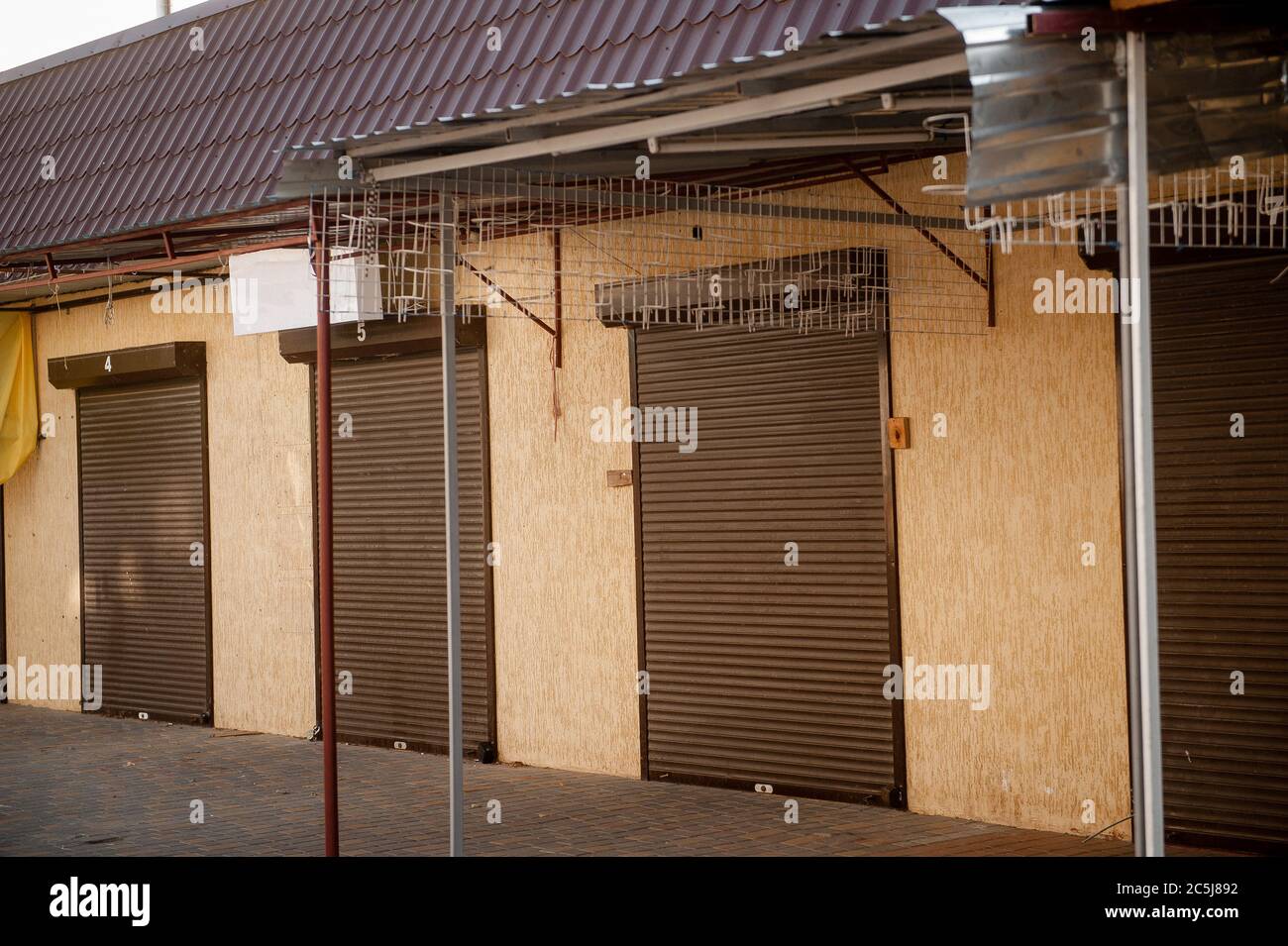 Metal store front gate closed hi-res stock photography and images - Alamy