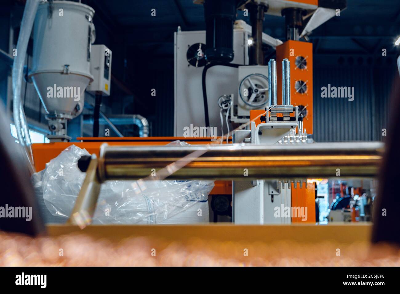 Inside a modern plant producing power electric cables and optical ...