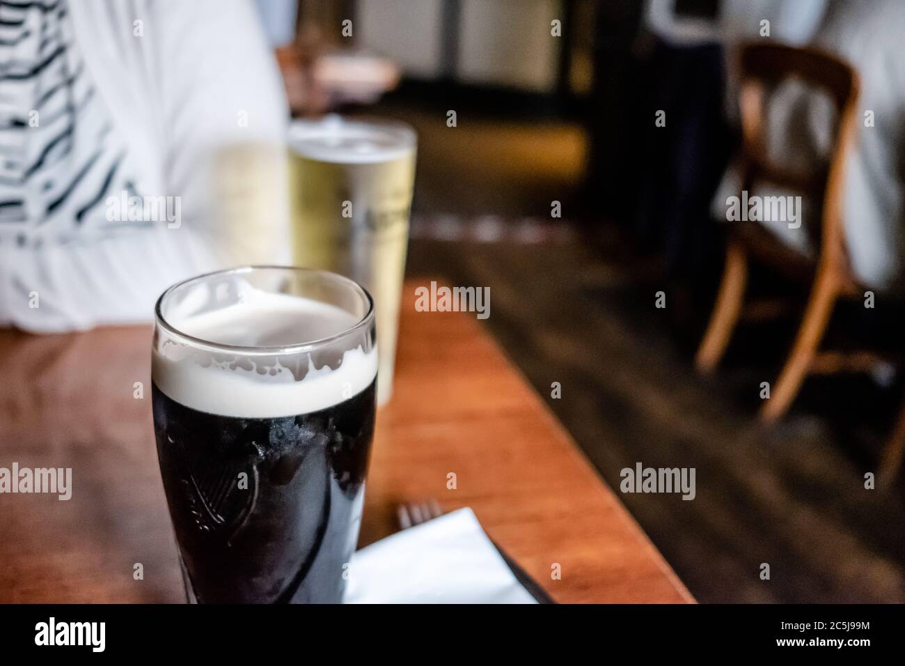 Guinness on a table hi-res stock photography and images - Alamy