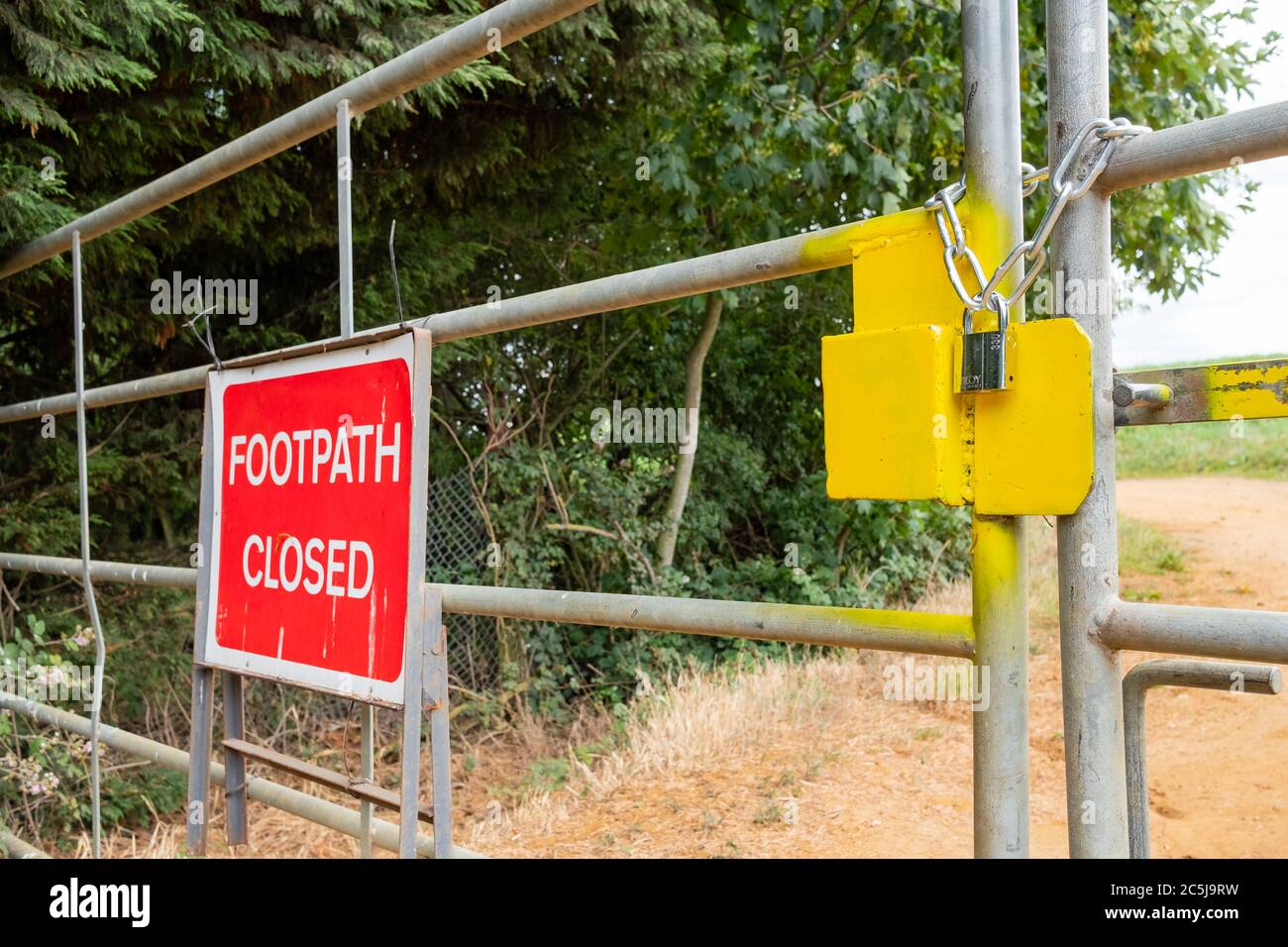 Newly erected Footpath Closed sign seen attached to a fence at a public ...