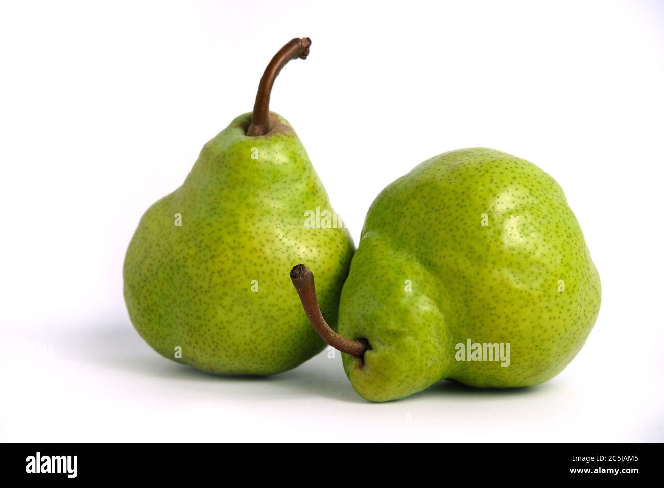 Two green Packham pears fruit isolated on white background Stock Photo ...