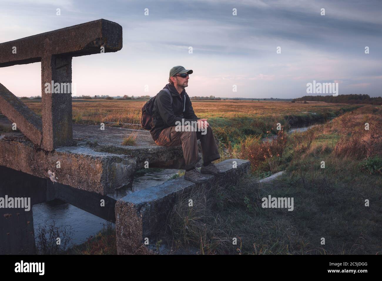 Old man at bridge hi-res stock photography and images - Alamy