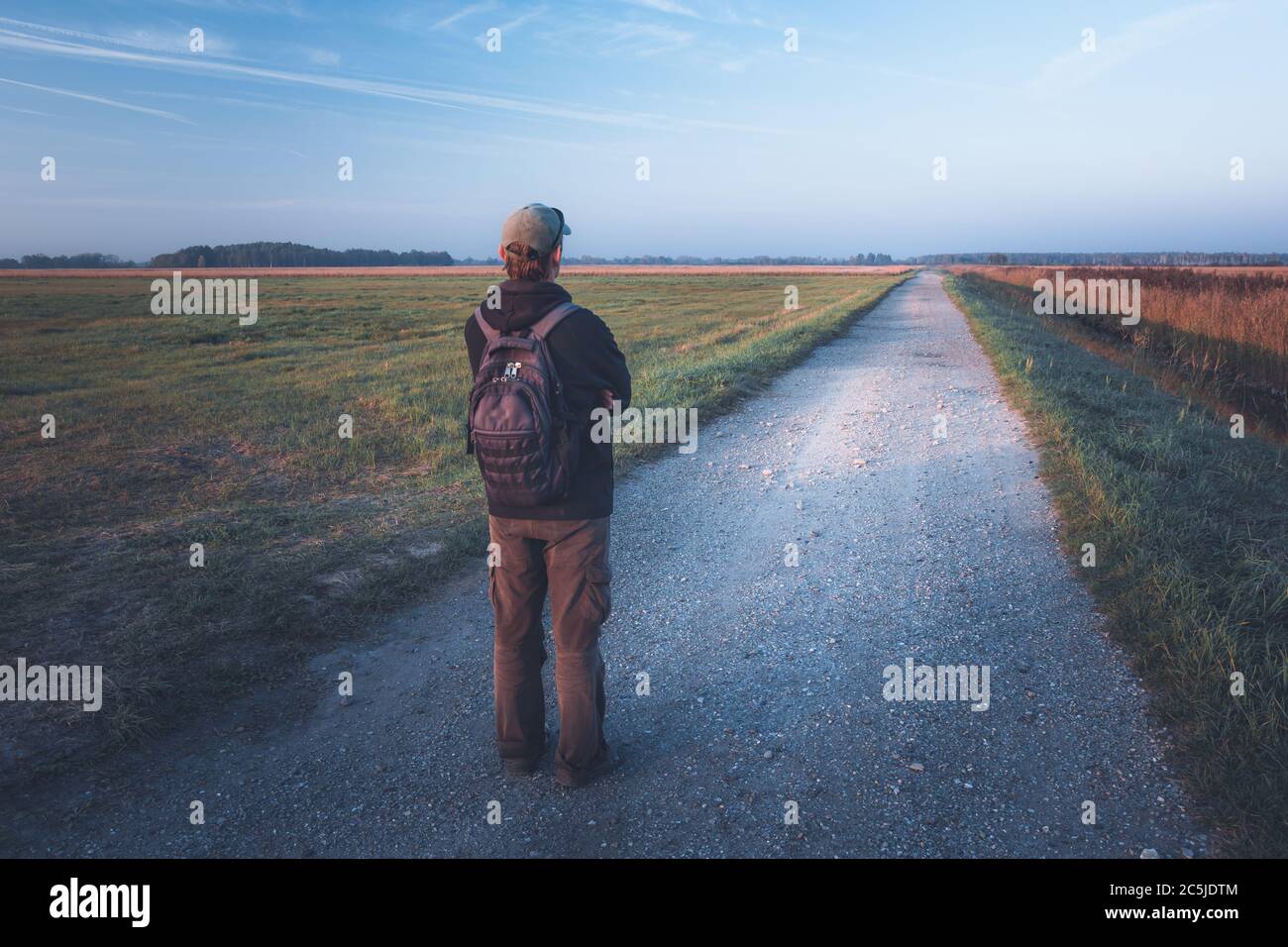 Man standing on the road hi-res stock photography and images - Alamy