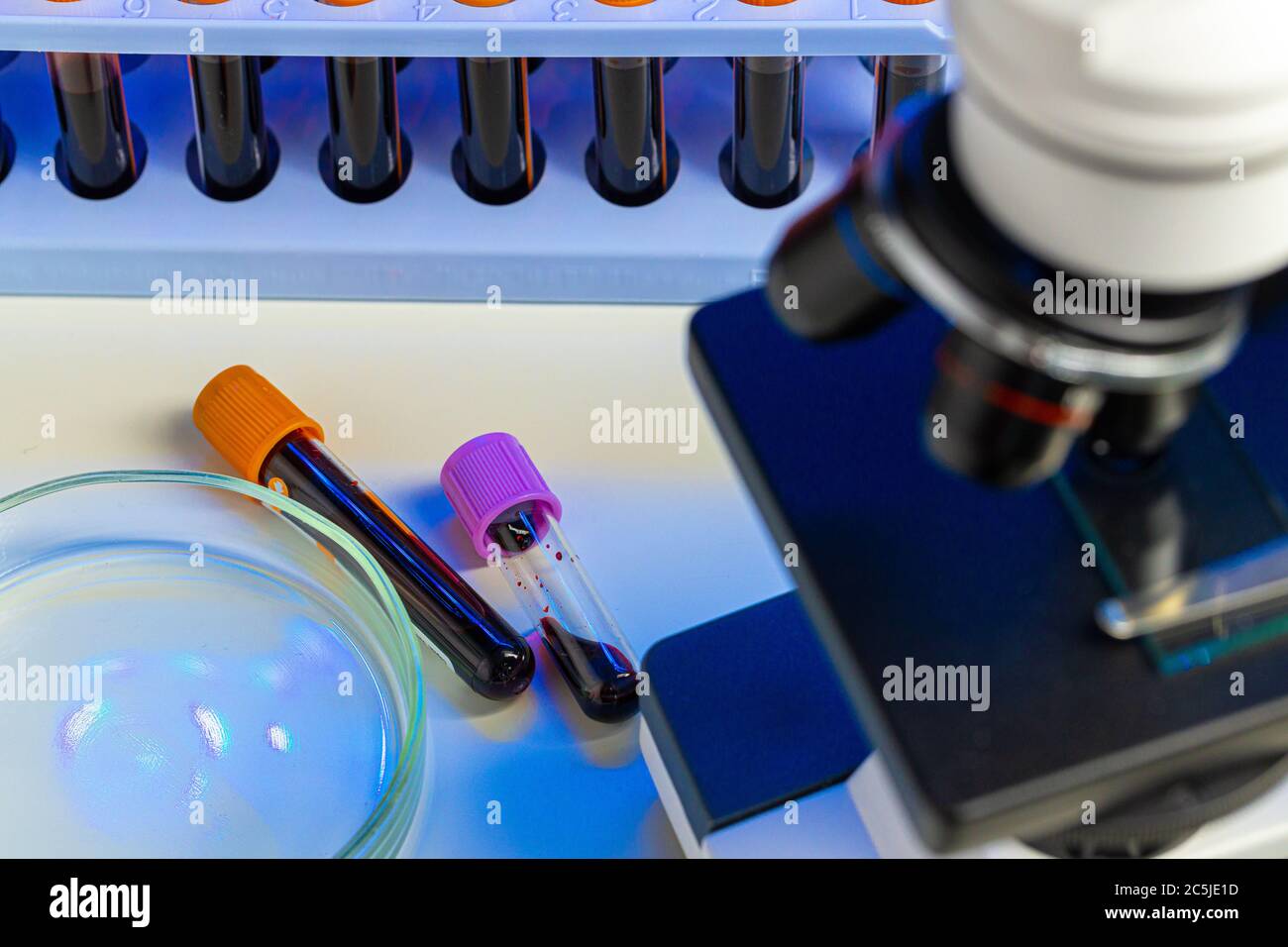 Close up photo of a microscope lenses examining glass sample Stock ...