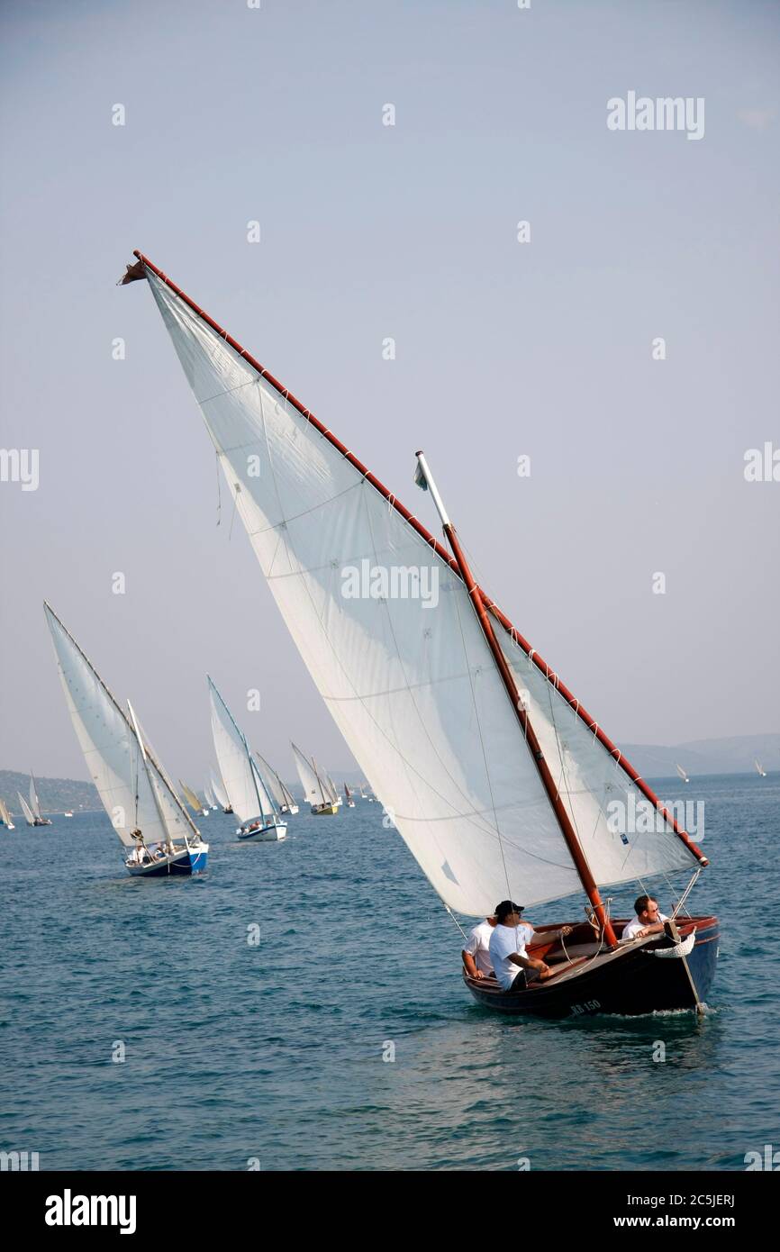 Traditional wooden sailboats during the regatta Latin Sail Stock Photo ...