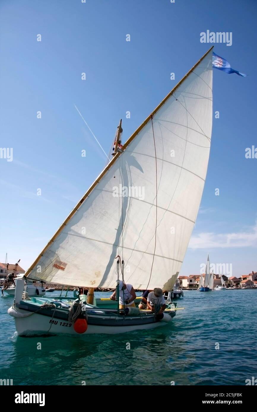 Traditional wooden sailboats during the regatta Latin Sail Stock Photo ...