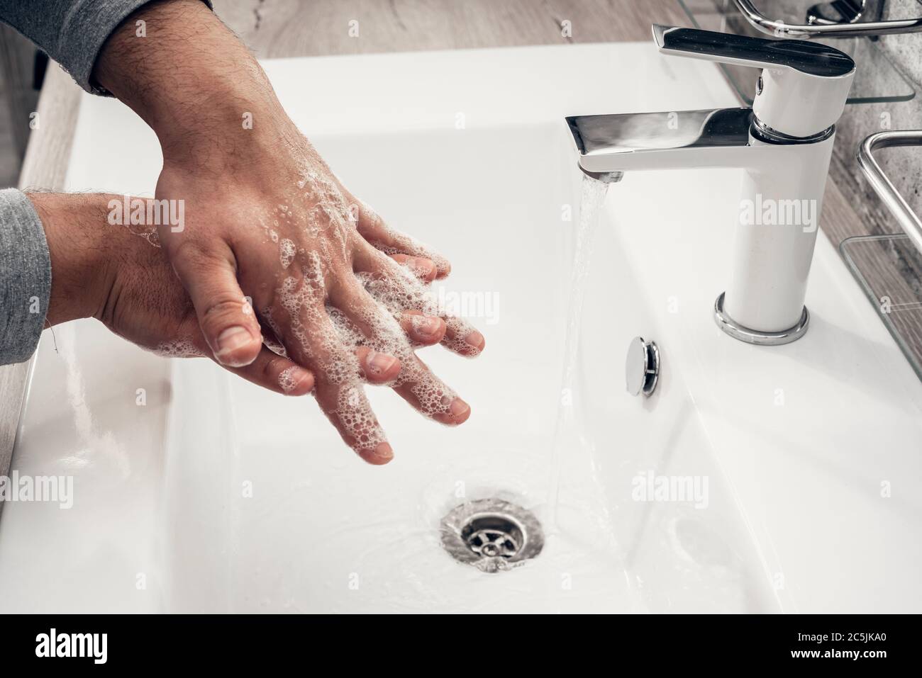 Coronavirus. Proper washing and handling of hands. Liquid antibacterial ...