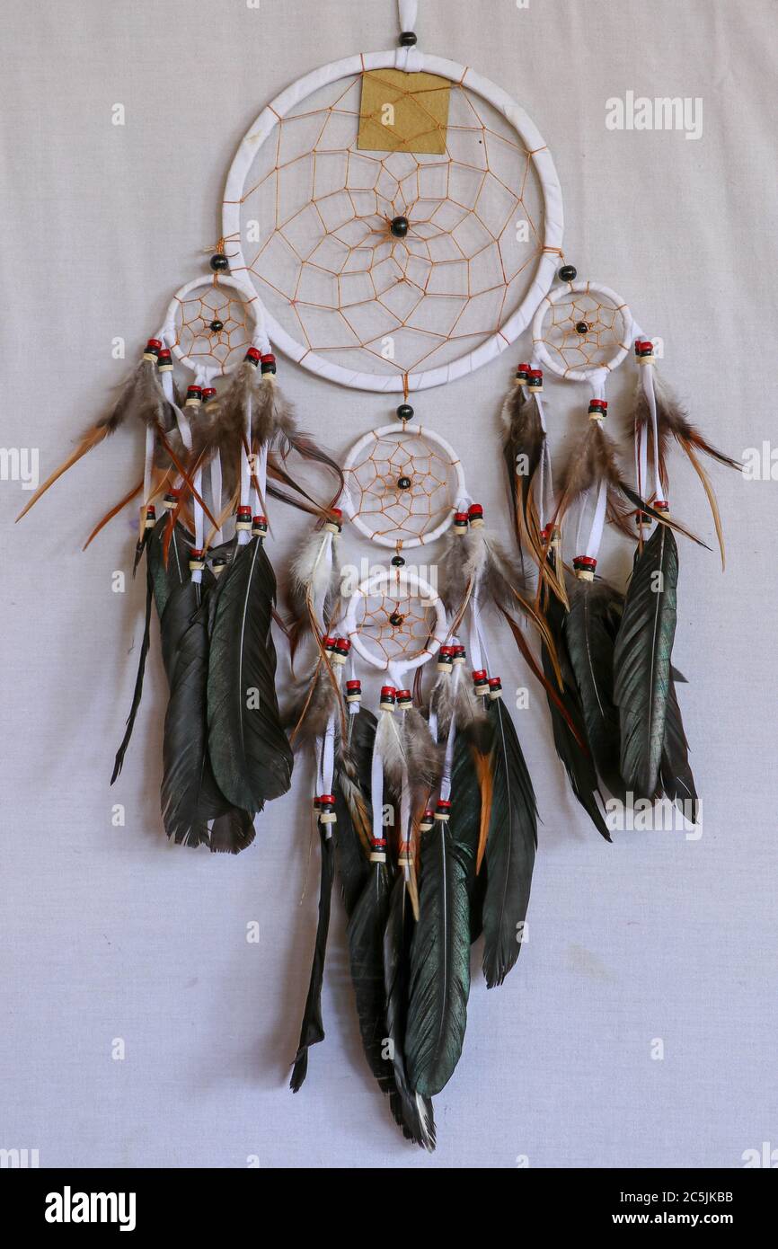 Real native dream catcher on pure white background Stock Photo - Alamy