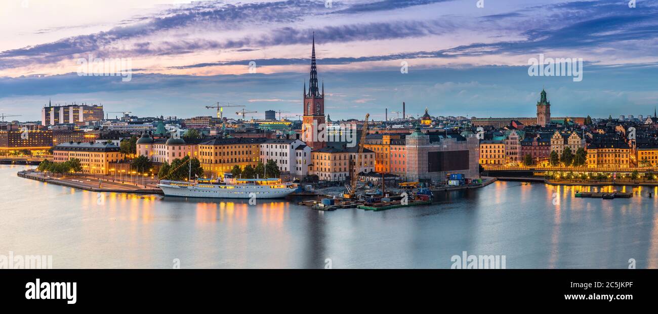 Scenic summer night panorama of the Old Town (Gamla Stan) architecture ...