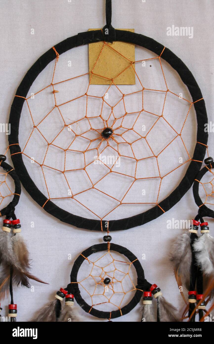 Real native dream catcher on pure white background Stock Photo - Alamy