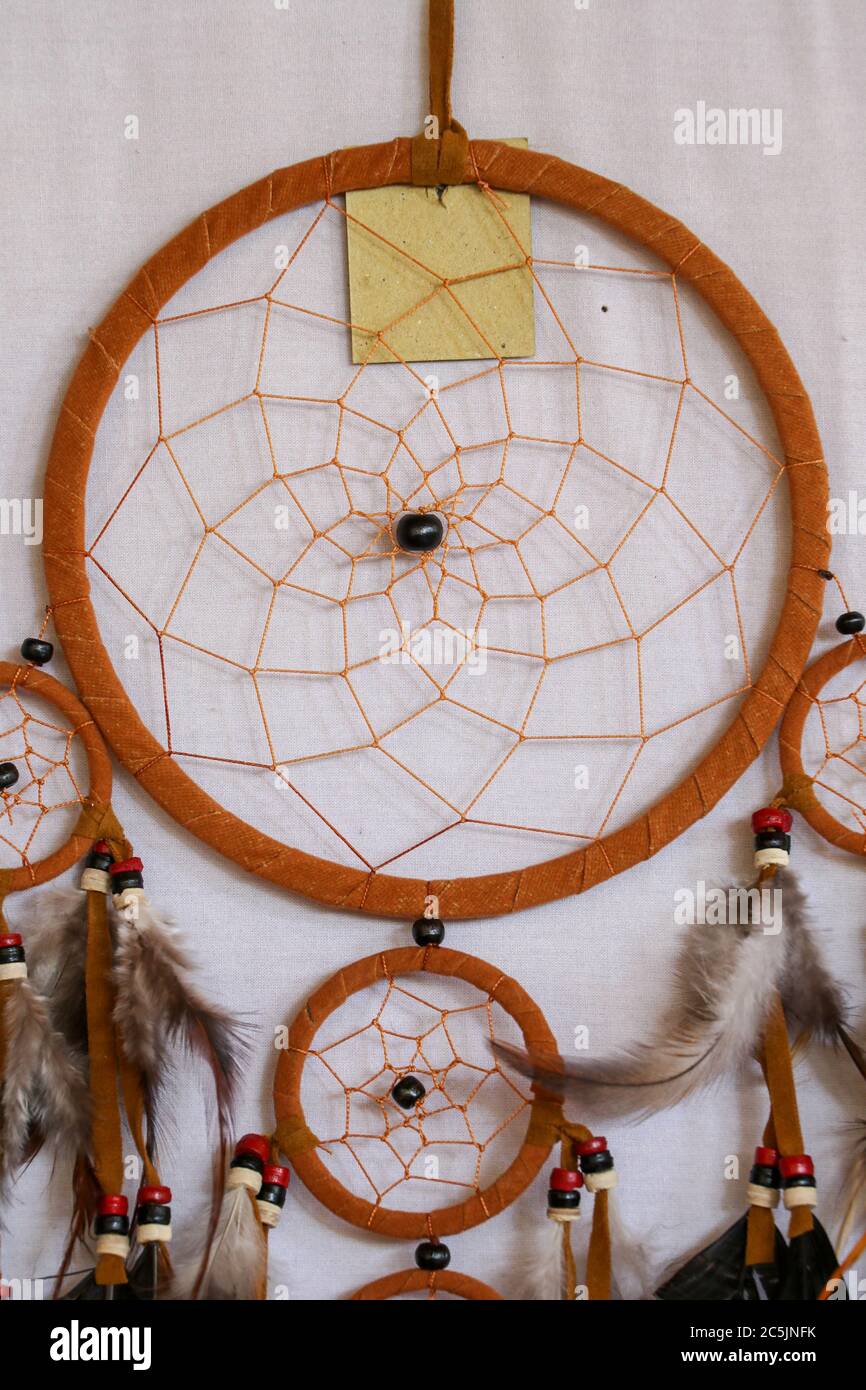 Real native dream catcher on pure white background Stock Photo - Alamy