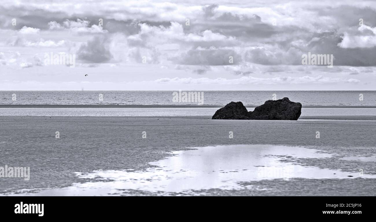 The Pennystone rock off the coast at Bispham on a stormy day with dark ...