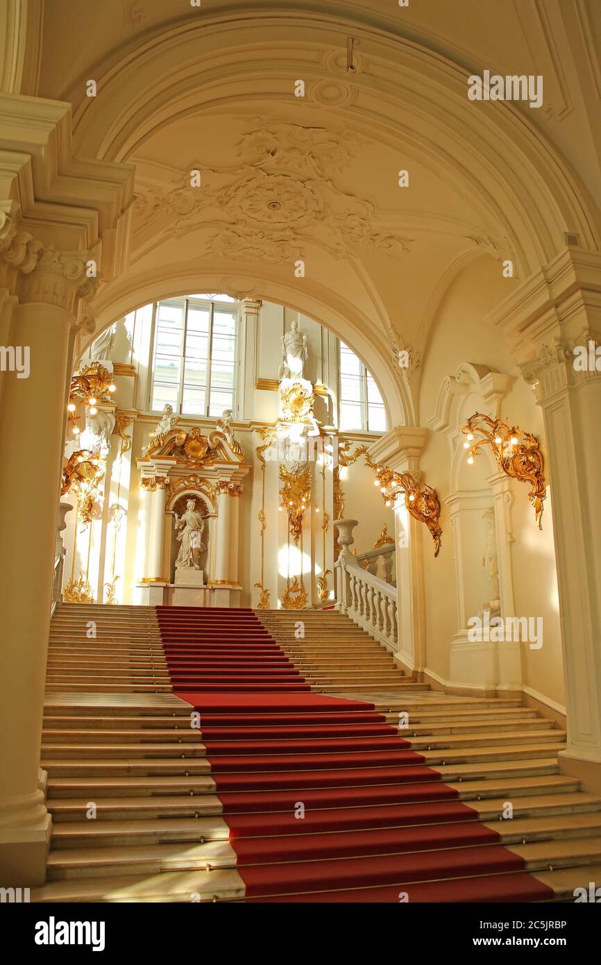 Beautiful decorated interior with gold & red carpet. Lower part of the ...