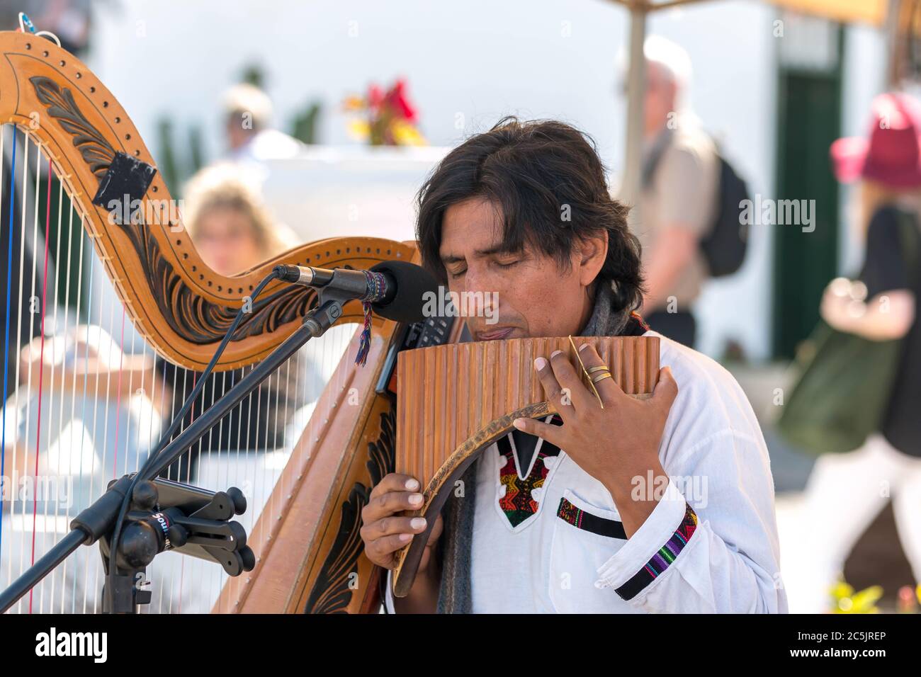 Man playing pipes hi-res stock photography and images - Alamy