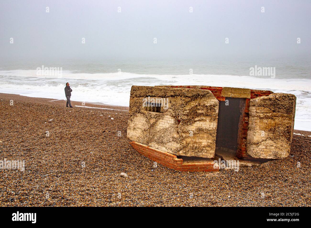 WW2 pillbox Kelling beach, UK on a cold summer's day. Concept: UK ...
